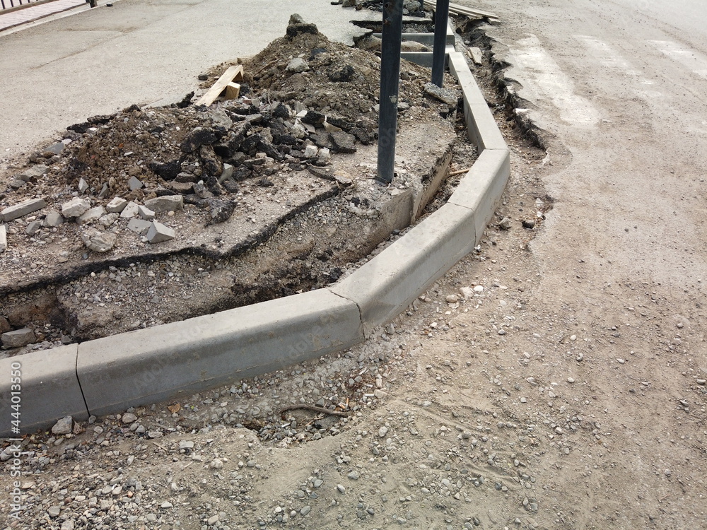 Road reconstruction repairment. New curbstone installed and ready to be ...