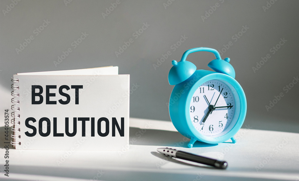 Best solution text in notepad with office tools, pen and alarm clock on ...