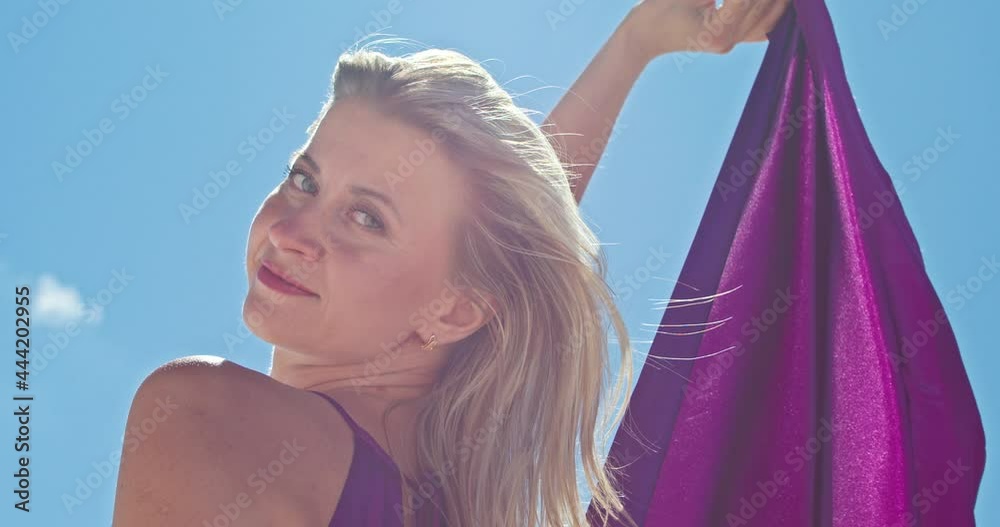 Cinematic slow motion of a woman walking on a sand dune. Barefoot woman ...