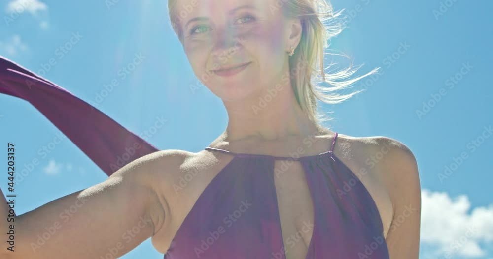 Cinematic slow motion of a woman walking on a sand dune. Barefoot woman ...