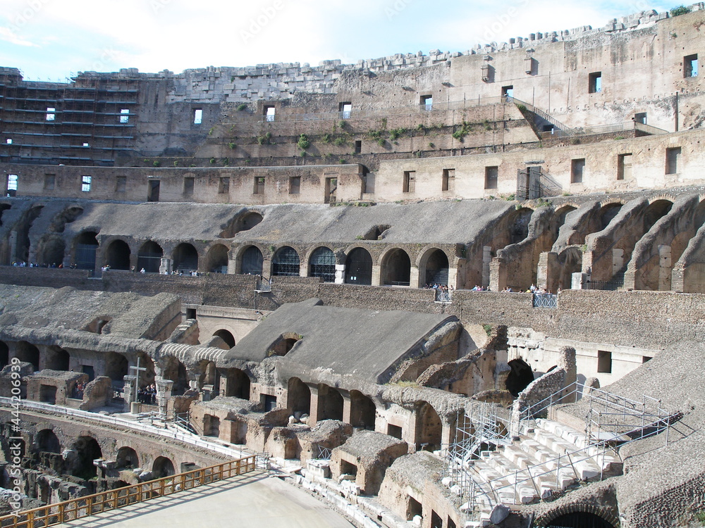 the interior of the ancient roman amphitheatre of the colosseum in rome ...