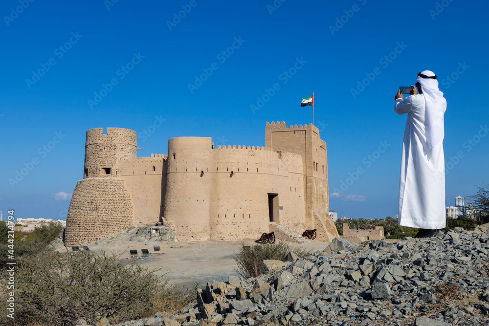 Middle Eastern Arab Emirati Vlogger holding mobile phone Stock Photo ...