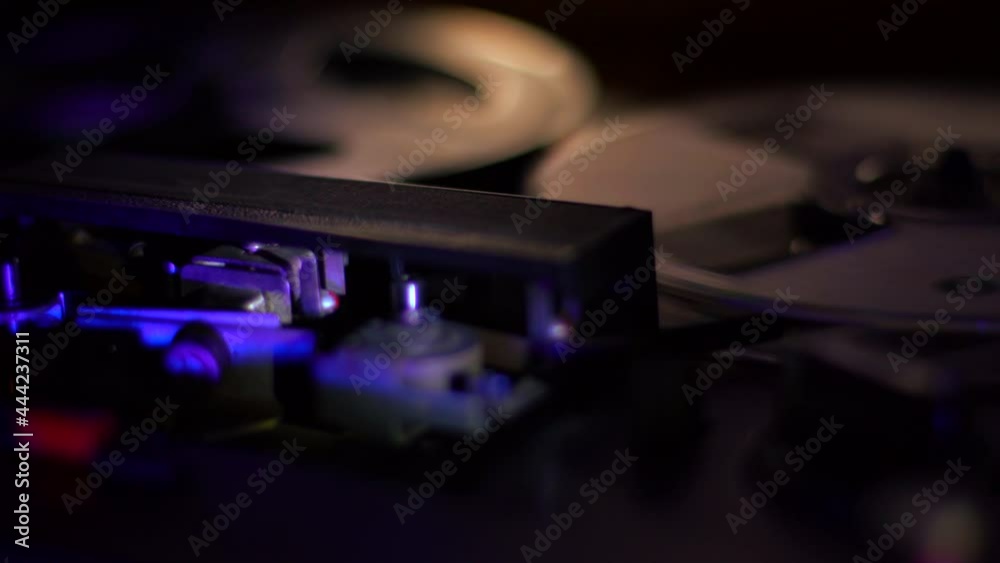 Playing a magnetic tape in a reel to reel tape recorder. Stock ビデオ ...