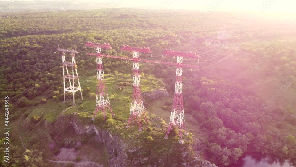 Stockvideon High voltage post.High-voltage tower sun beam. High voltage ...