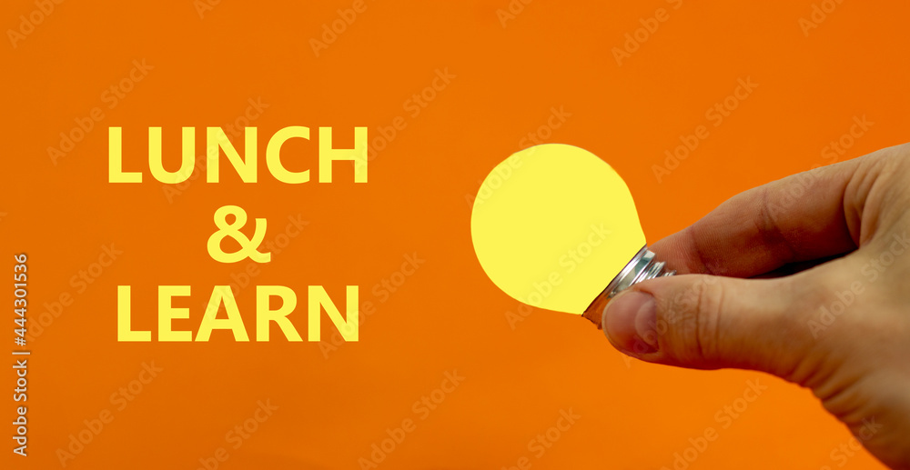 Lunch and learn symbol. Businessman holds yellow shining light bulb ...
