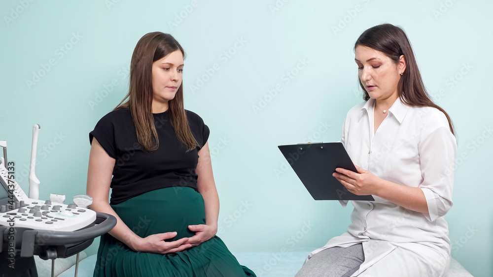 Pregnant woman answers lady doctor questions during interview before ...