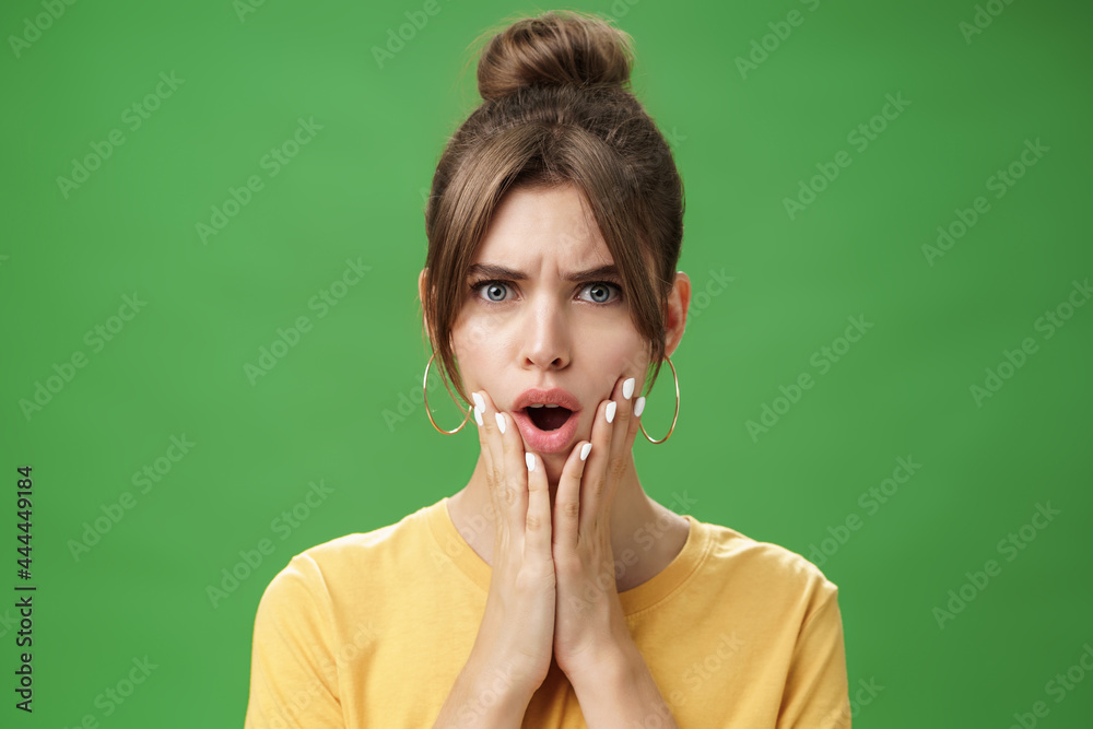 Shocked woman reacting to pimple looking disturbed and displeased in ...