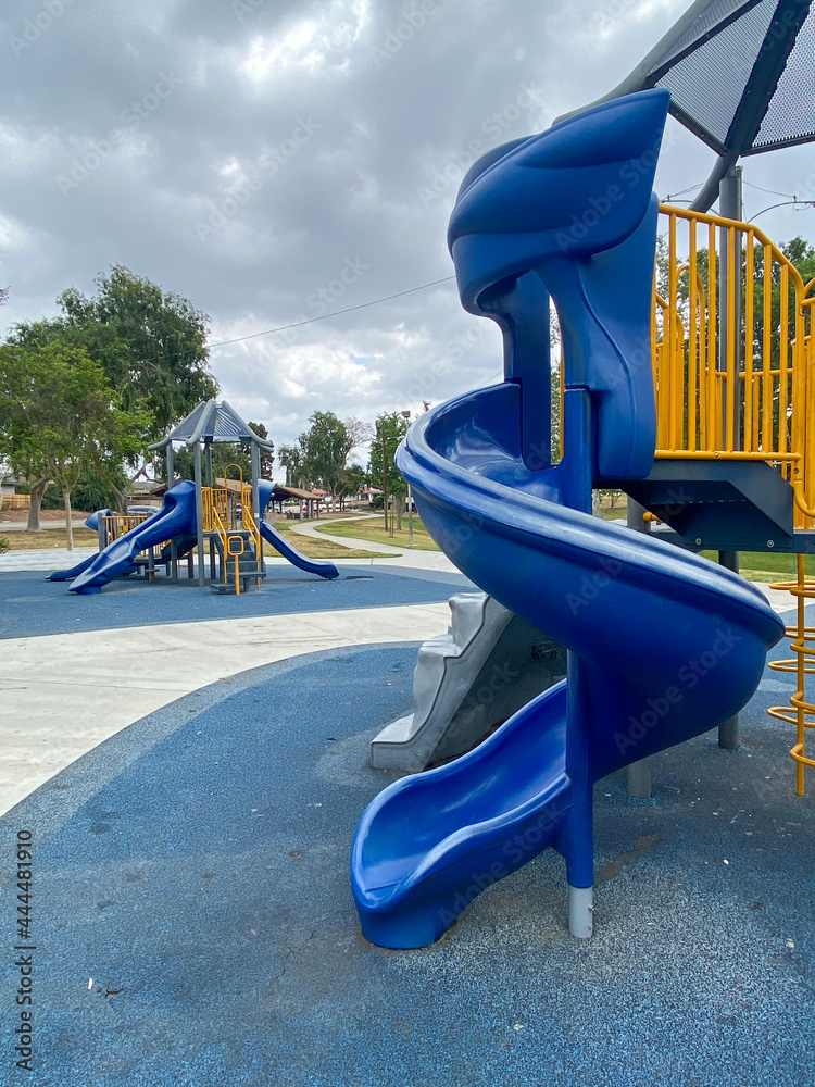 Slide, swing on modern playground. Children playground activities in ...