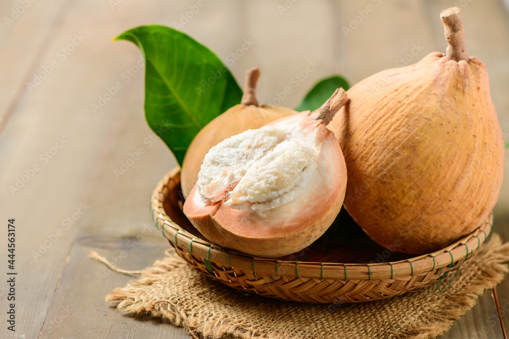 Half Santol on wood background, Santol is famous fruit of Lopburi ...
