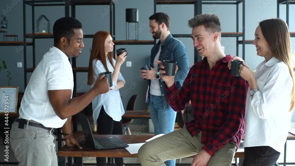 Group of young five cheerful diverse multi-ethnic coworkers having fun ...