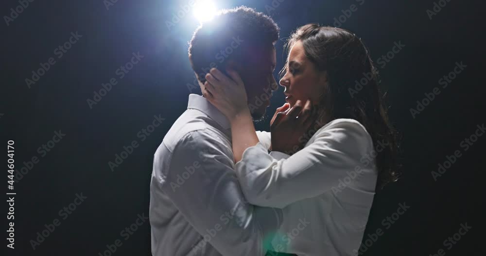Romantic scene, partners approaching each other, grasping hands, man's ...