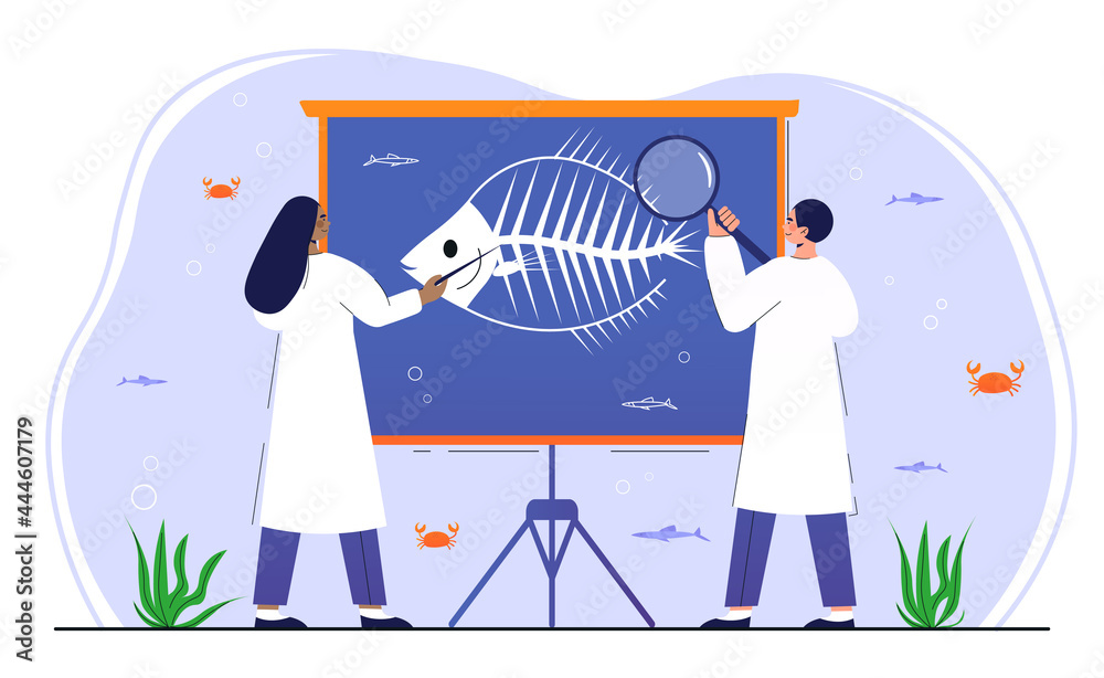 Male and female ichthyologists are studying fish species together ...