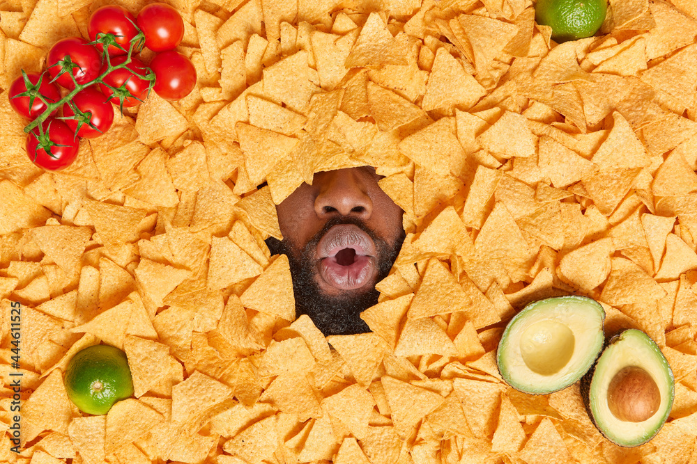 Stunned surprised man with only mouth shown keeps lips rounded makes ...