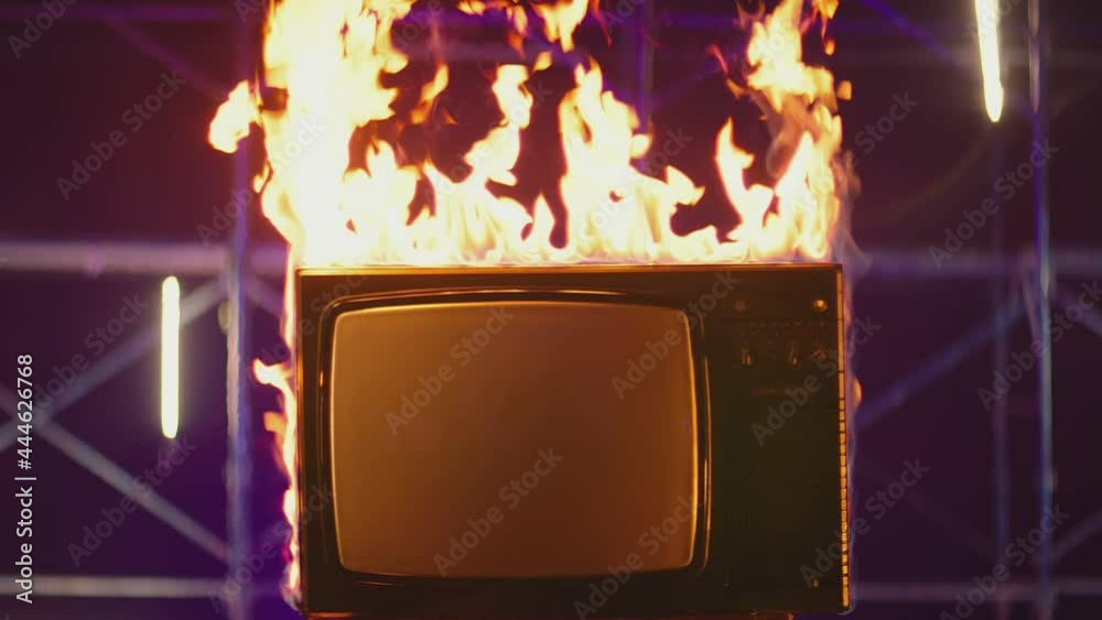 Old TV Set with big Screen in Fire . Old TVs burning on fire . Concept ...
