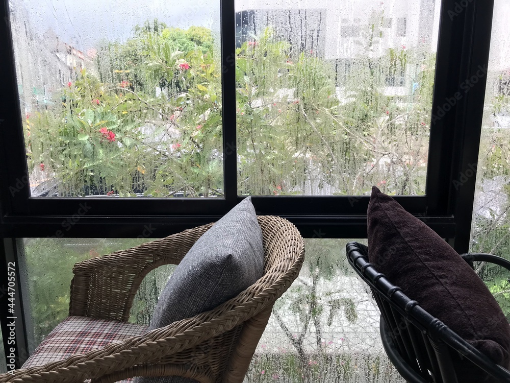 Day atmosphere The rain of a day, taken through a window, causes the ...