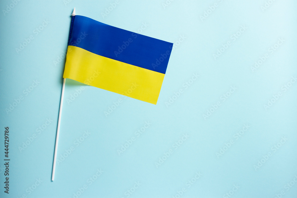 Ukrainian flag on a blue background in honor of Ukraine's Independence ...