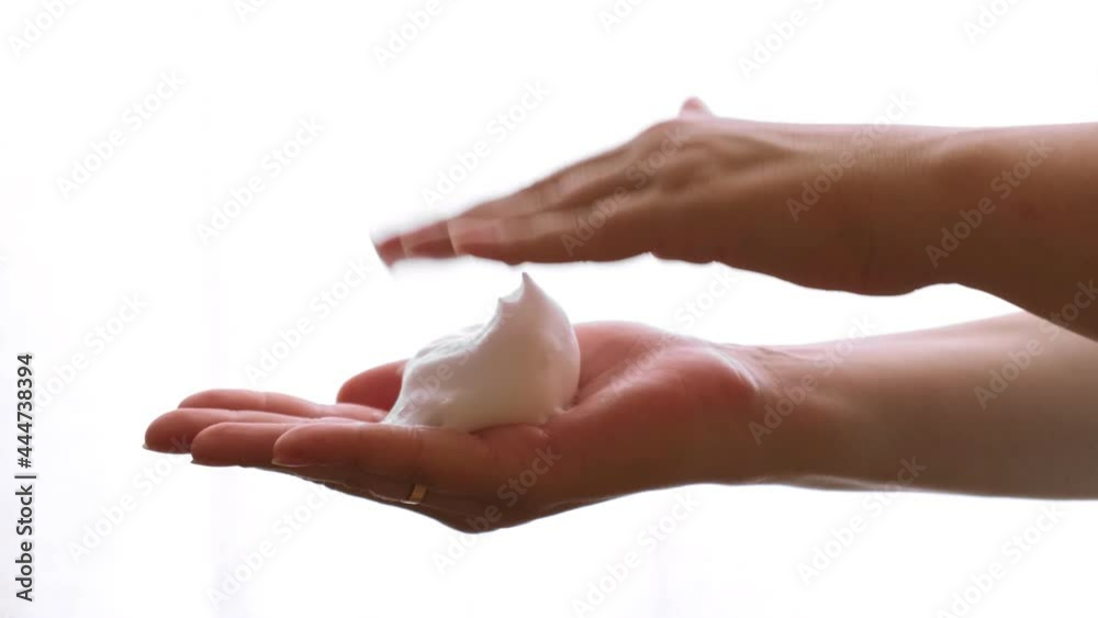 Woman hand are washing with soap bubbles. Closeup young Asian woman ...