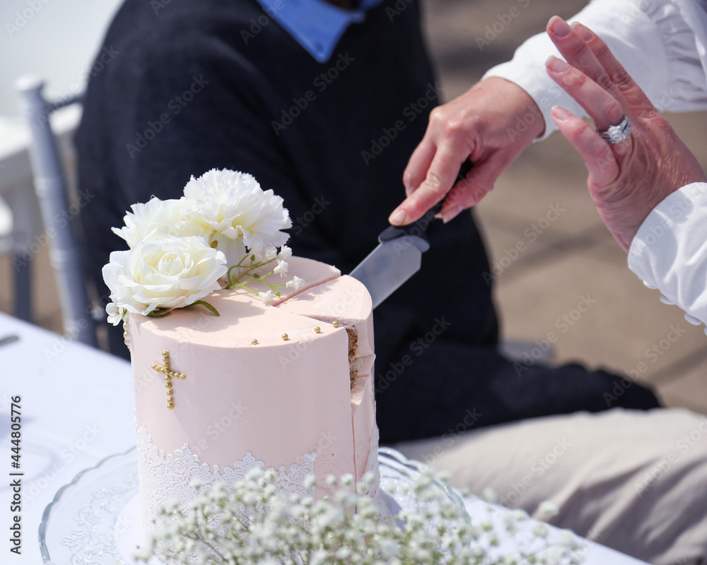 Cutting a Christening or Baptism Cake Stock Photo | Adobe Stock