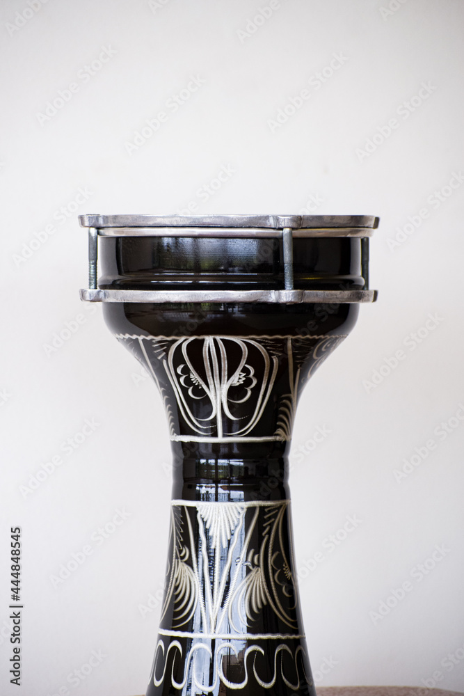 The goblet drum or darbuka drum is a single head membranophone with a ...