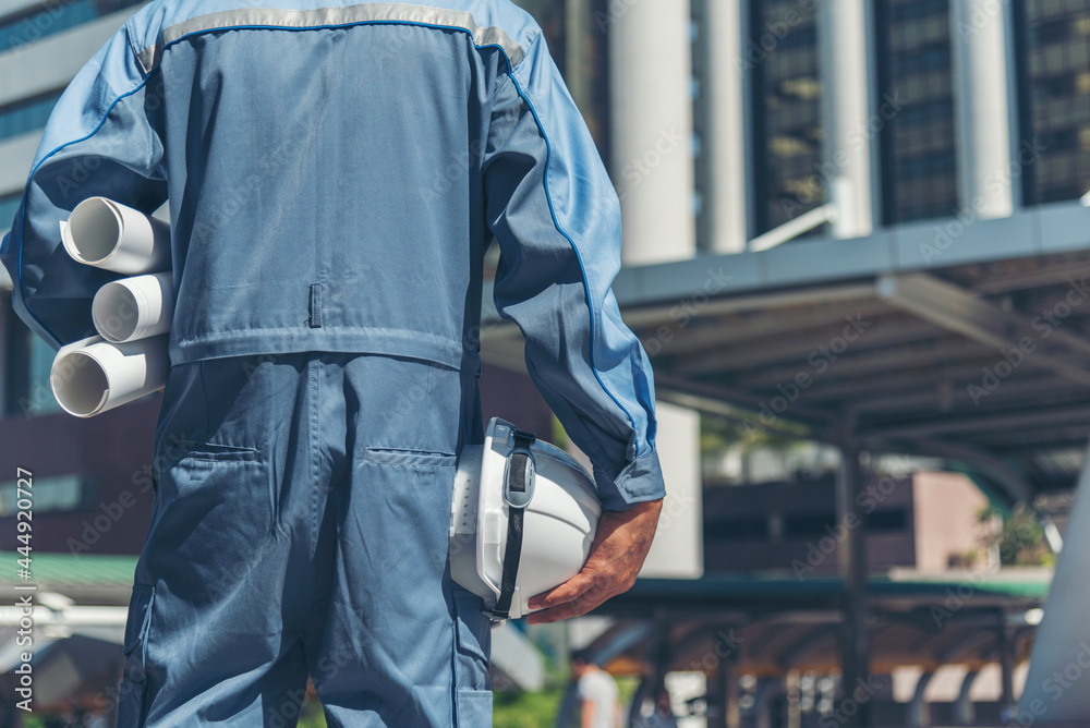 Engineer man hands holding hardhat white work helmet hard hat for ...