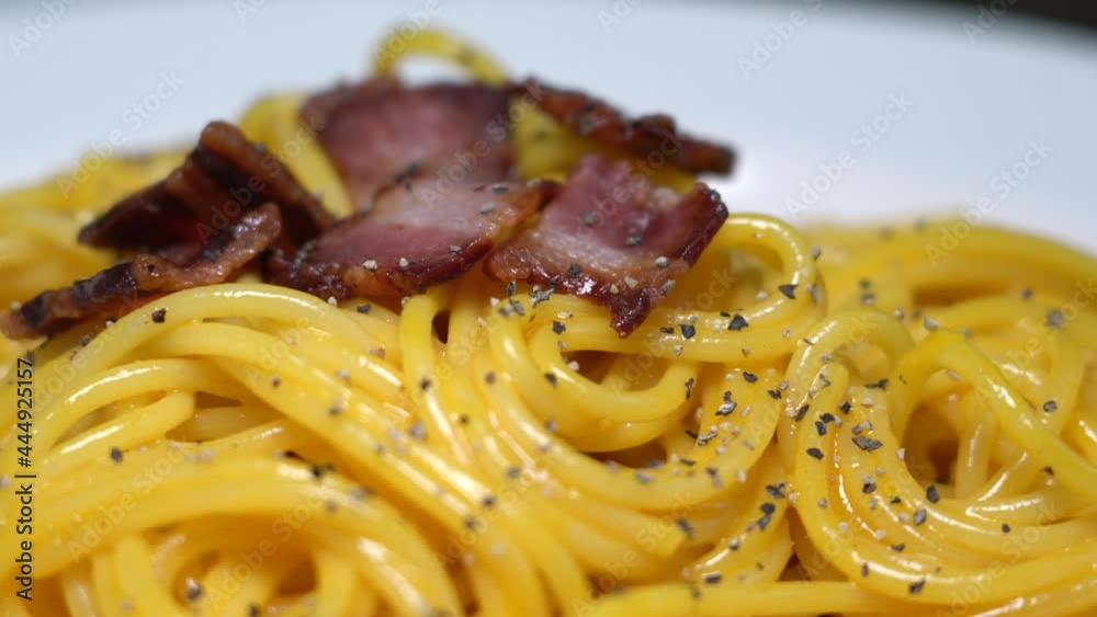 Spaghetti carbonara, a traditional pasta dish of Italian culture made ...