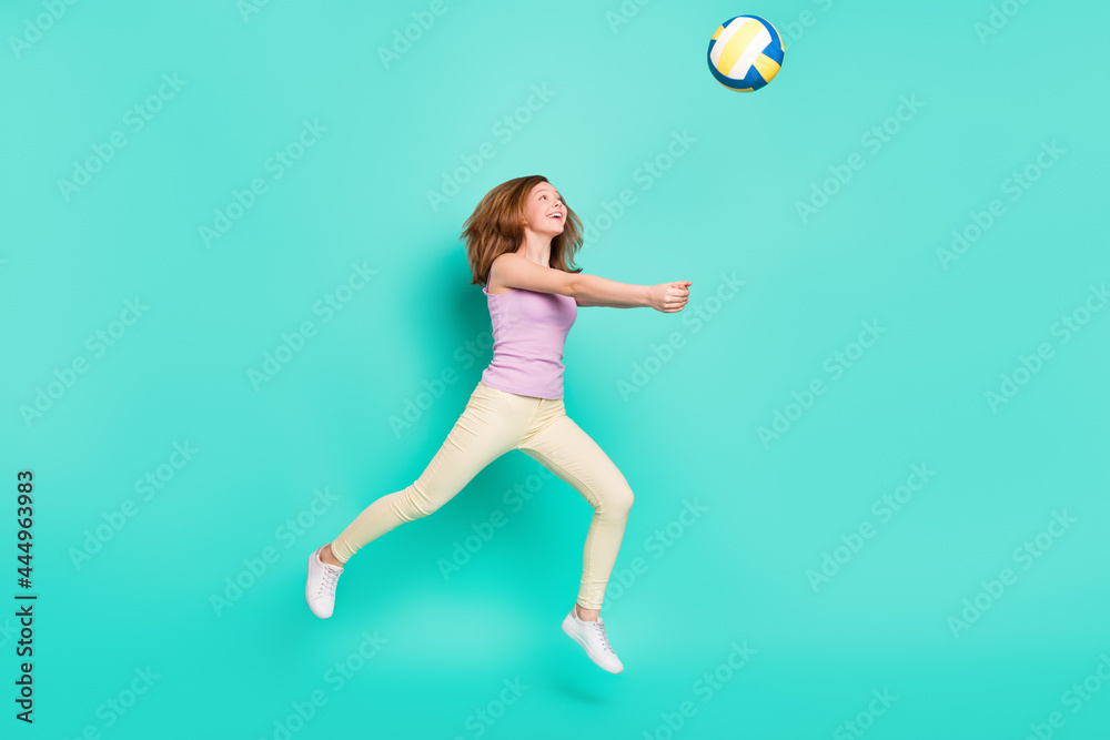 Full length body size photo girl jumping up playing volleyball isolated ...