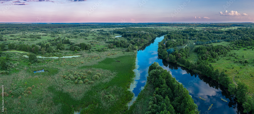 Canoes on the calm river. Top view. Beautiful picture of river and ...