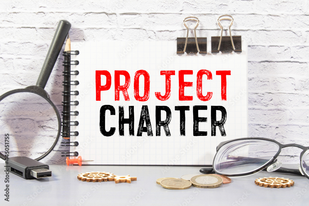 Project Charter on sticky notes isolated on white background. Stock ...