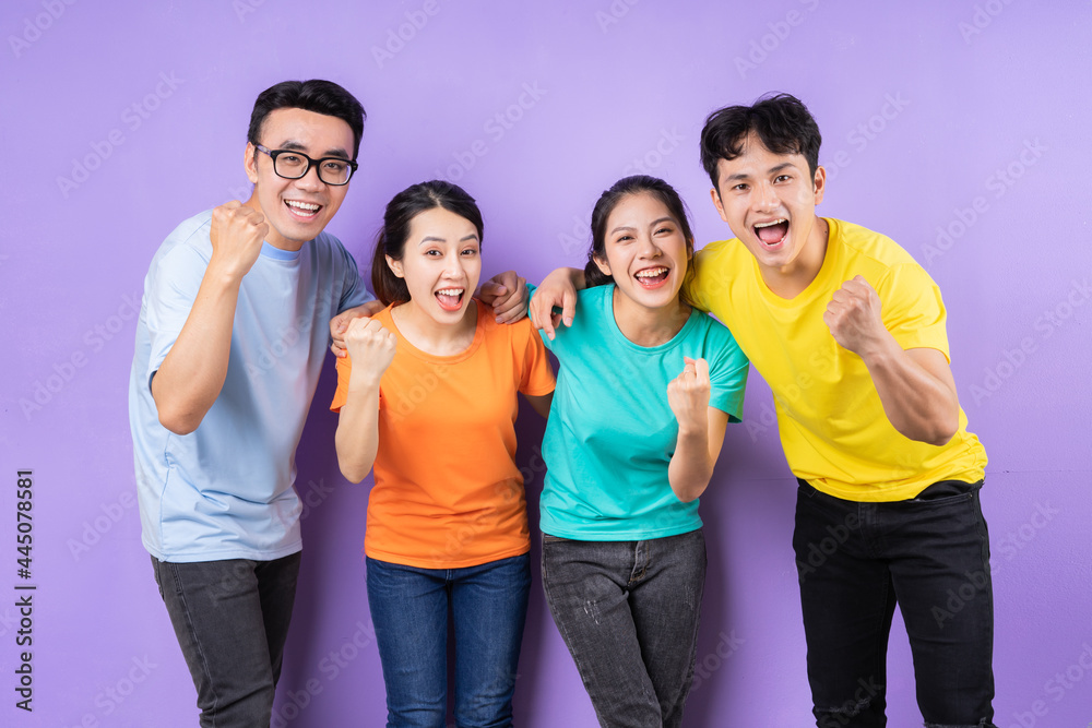 Asian best friends posing on purple background Stock Photo | Adobe Stock