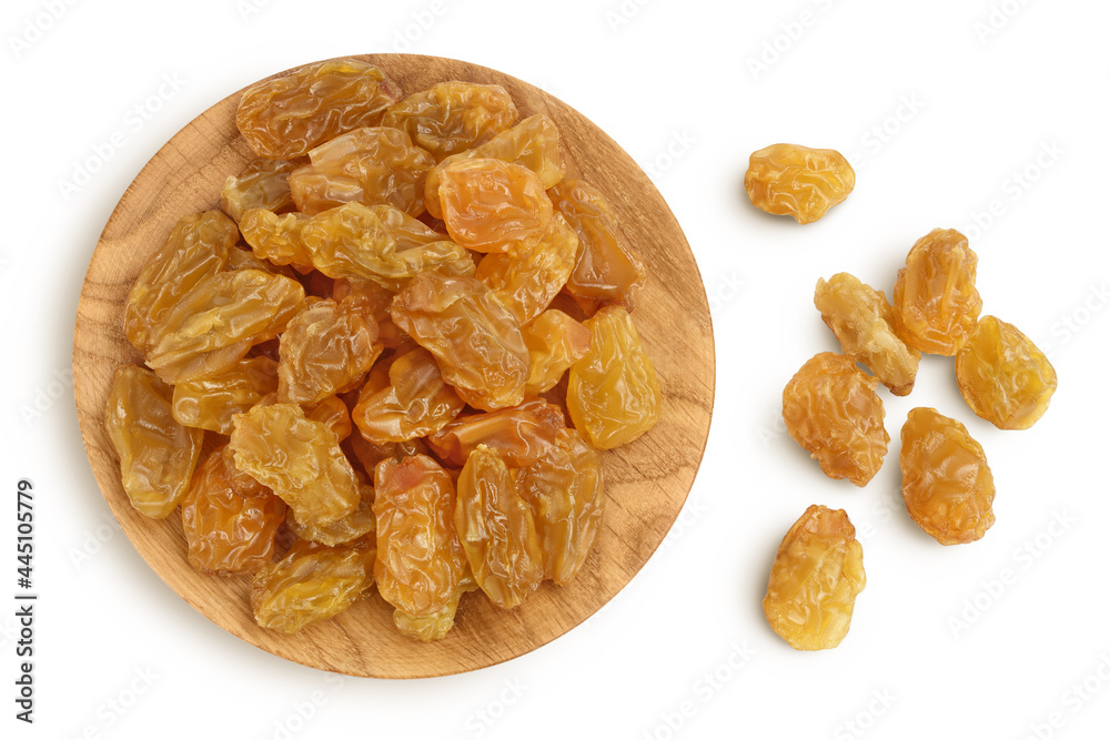 Yellow raisins in wooden bowl isolated on white background with ...