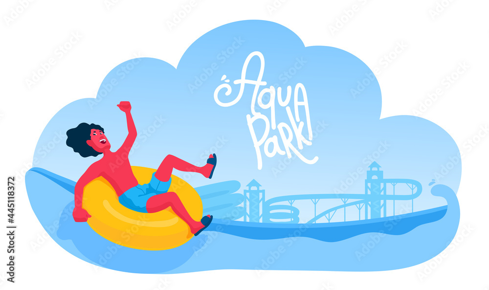 Man on a water slide on an inflatable ring. A waterpark, aquapark ...