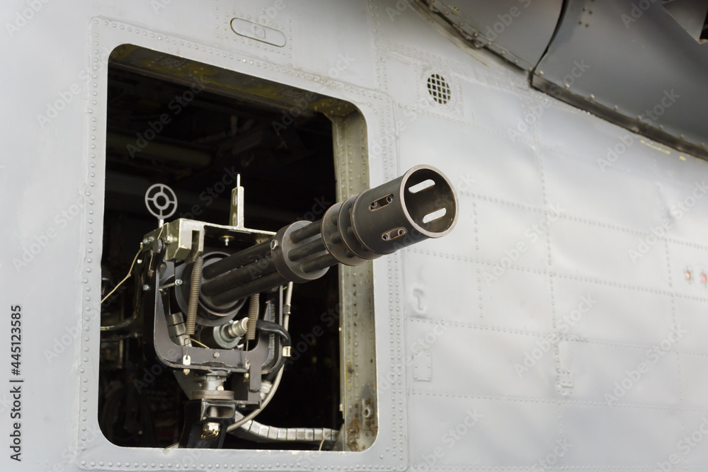 GAU-17 or M134 Minigun mounted on a military helicopter. An ...