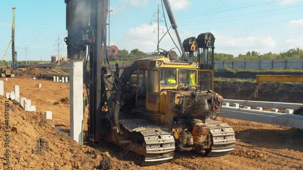 Aerial photograph of a drilling rig for driving piles on a construction ...