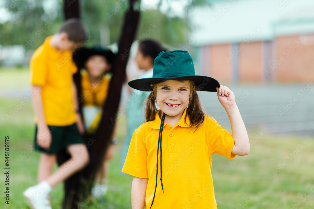 Portrait of Aussie child at public school with sun hat on Stock Photo ...