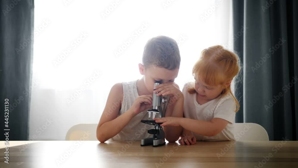 Child baby caucasian little boy scientist biologist researcher working ...