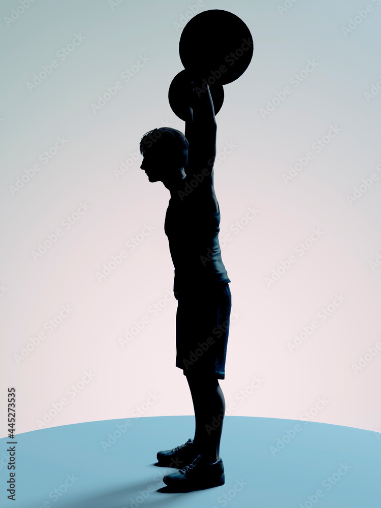 Backlit man lifting a bar with weights above his head. Over head squat ...