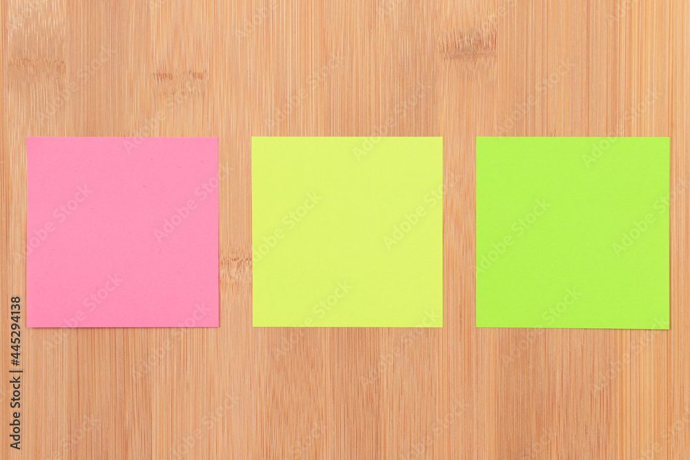 Colored Sticky Notes with Copyspace Pinned to the Wooden Message Board ...