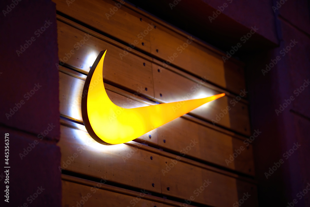 Minsk, Belarus. Jul 2021. Nike neon logo sign glowing at night. Nike ...