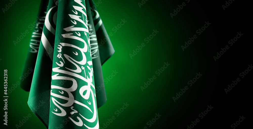 Saudi Arabia flags on left side with a dark green background, use it ...