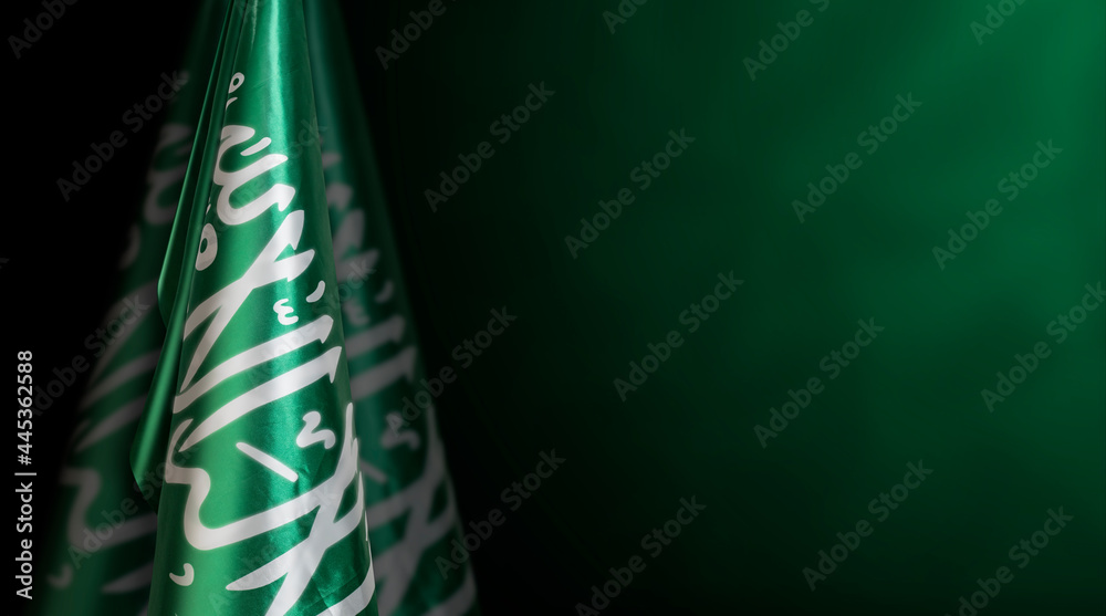 Saudi Arabia flags on left side with a dark green background, use it ...