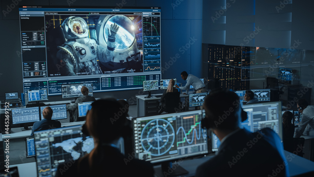 Group of People in Mission Control Center Establish Successful Video ...