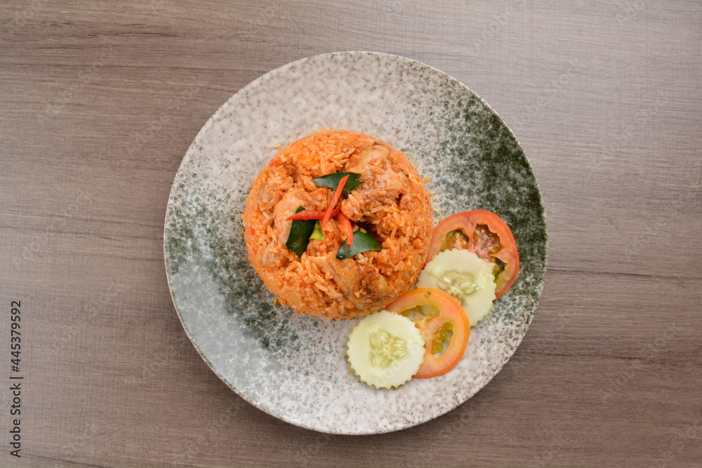 spicy chilli sambal chilli tomato wok fried rice nasi goreng on wood ...