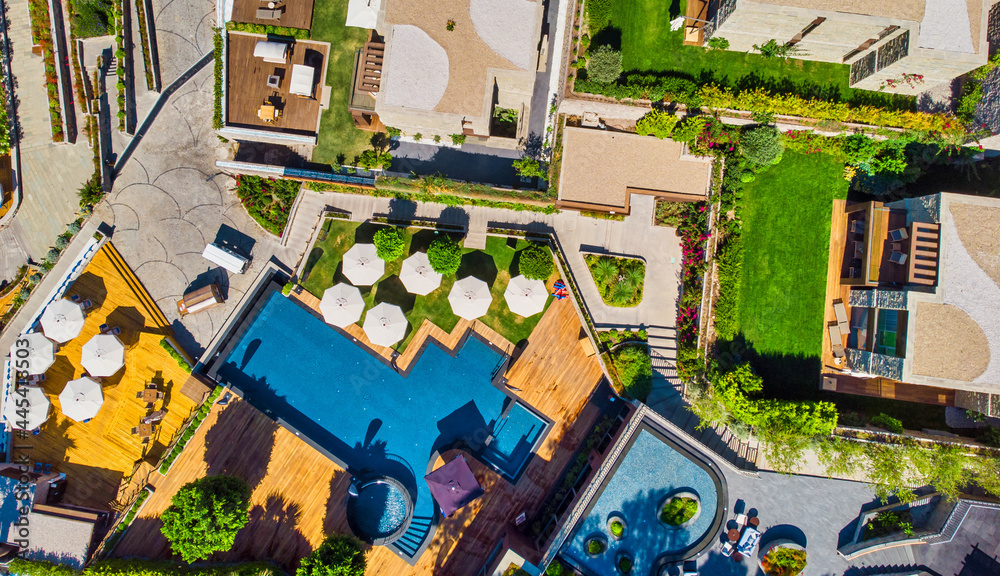 Swimming Pool viewed from above. Top down view of modern luxury villa ...