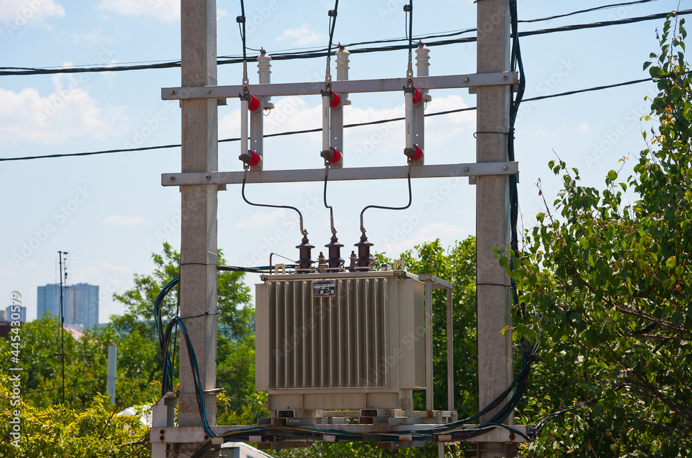 High voltage transformer on poles, fuses and wires. Stock Photo | Adobe ...
