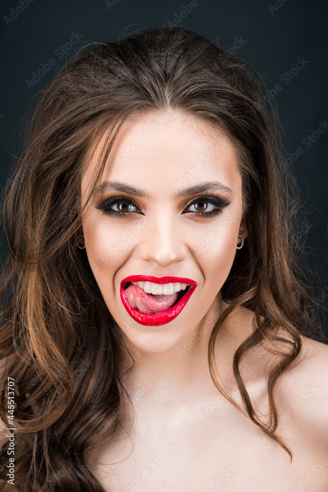 Sensual woman open mouth, tongue touches the teeth. Close-up licking ...