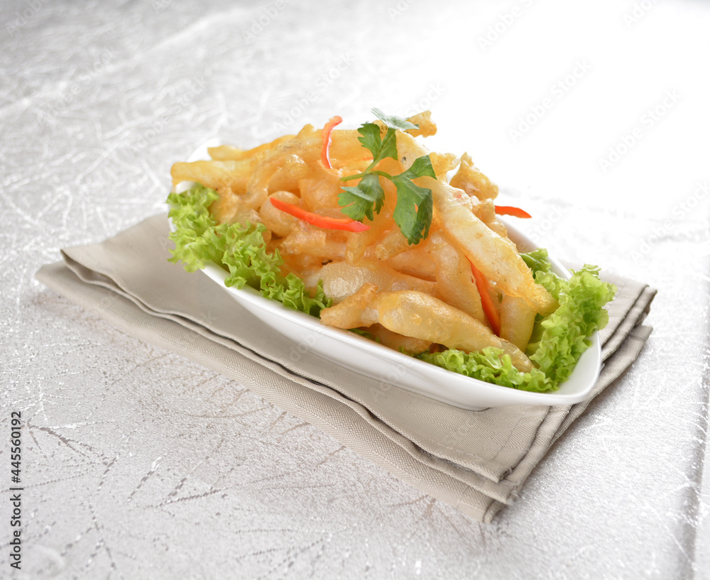 Deep fried crispy mini silver fish seafood snack with vegetables in ...