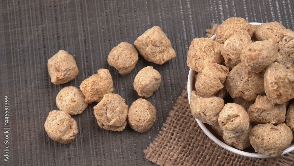 Raw soya chunks on dark background. Healthy, nutritious soybean meat ...