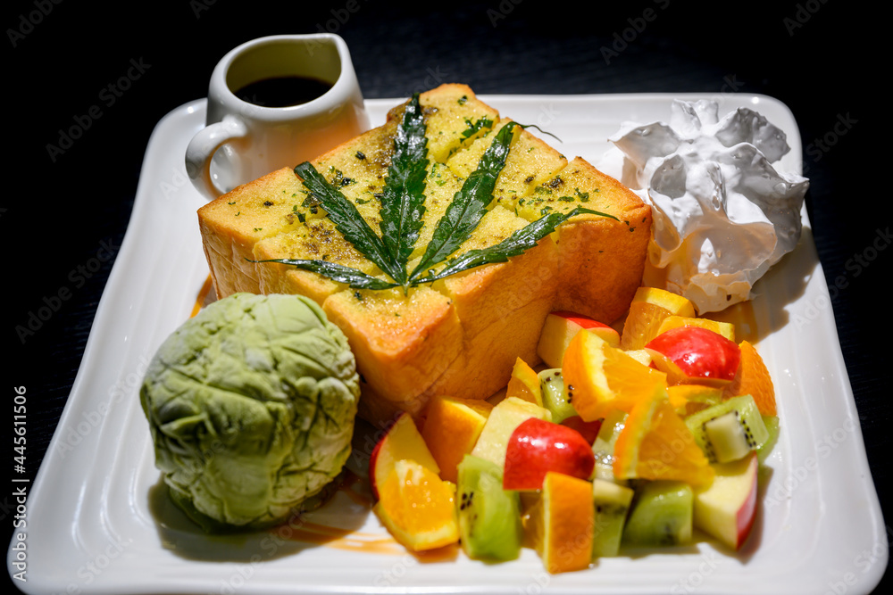 Image of cannabis honey toast and mixed fruits in a white plate with ...