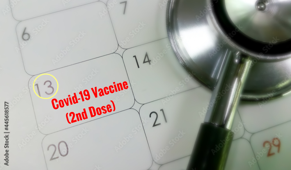 Covid-19 coronavirus vaccine (2nd dose) reminder on calendar with ...