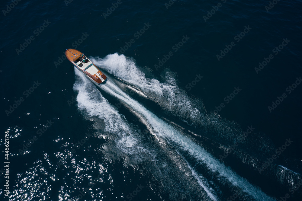 Top view of a wooden powerful motor boat. Luxurious wooden boat fast ...